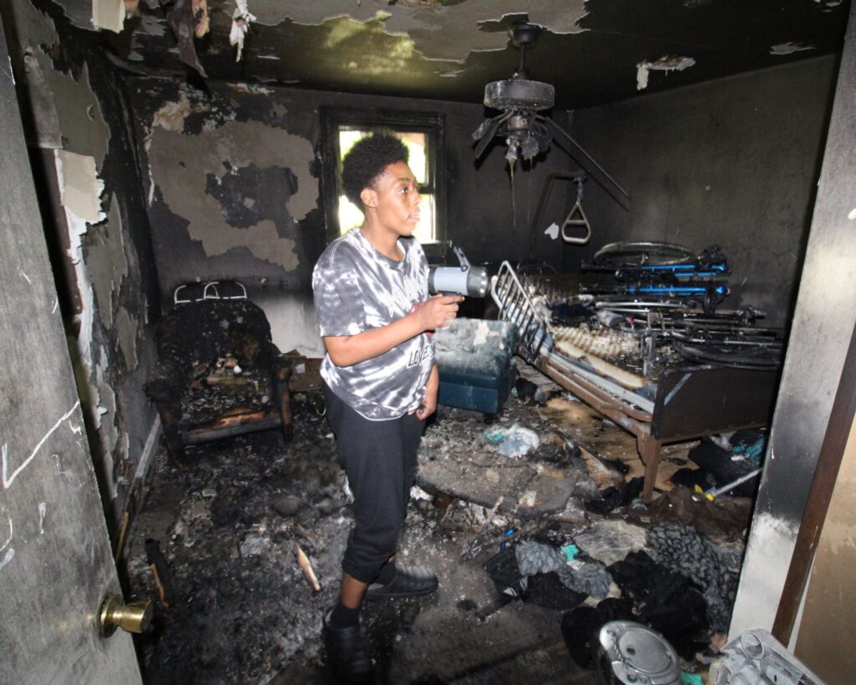Woman charged with arson in house fire