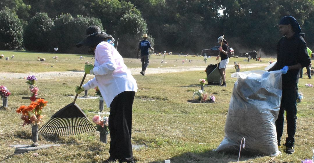 Volunteers work to clean up Hamilton Burial Garden