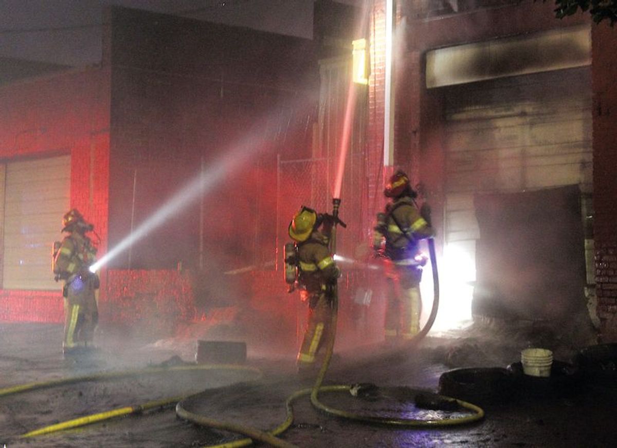 Wilson firefighters called 'champions' after tire shop blaze