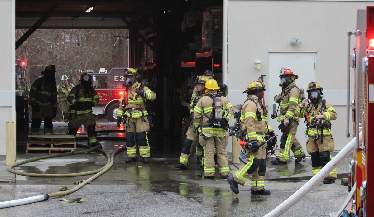 Firefighters extinguish forklift fire at Adams Carpet One