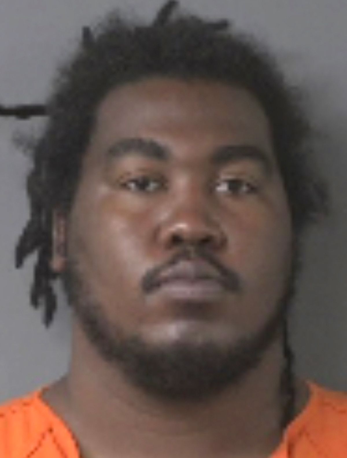 Police charge man in Wilson shooting