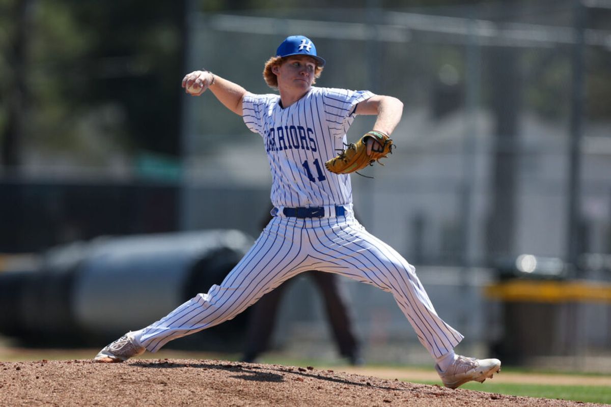 AREA ROUNDUP: Warriors clip Trojans in key QCC scrap