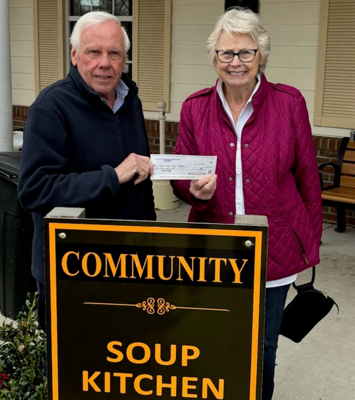Church gives donation to soup kitchen