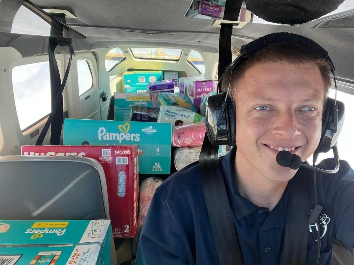 Aviation company flies supplies to storm victims