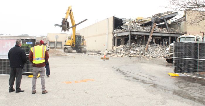 Demolition crew starts tearing down Wilson Mall
