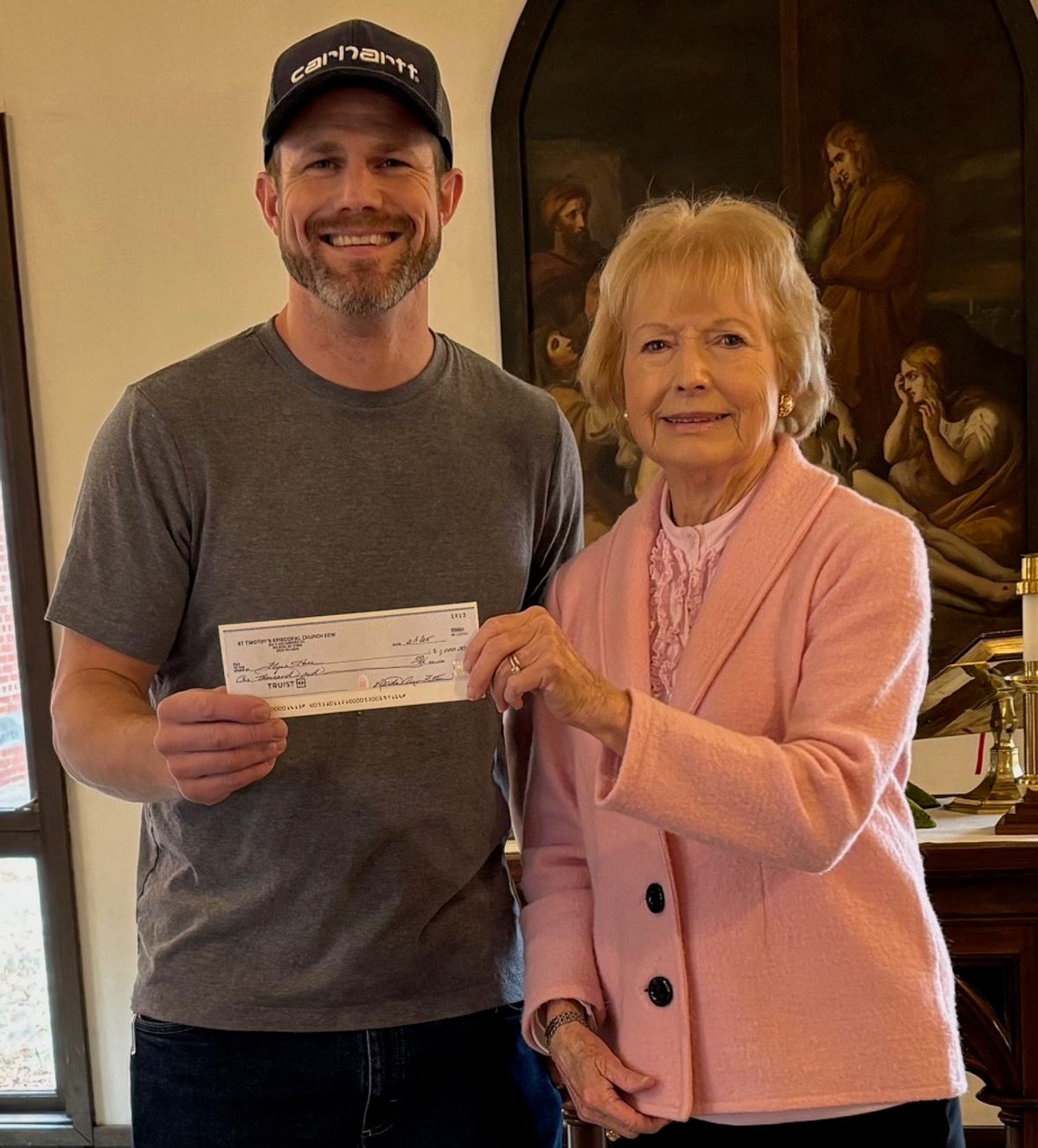 Church gives donation to Flynn Home and 3/4 House