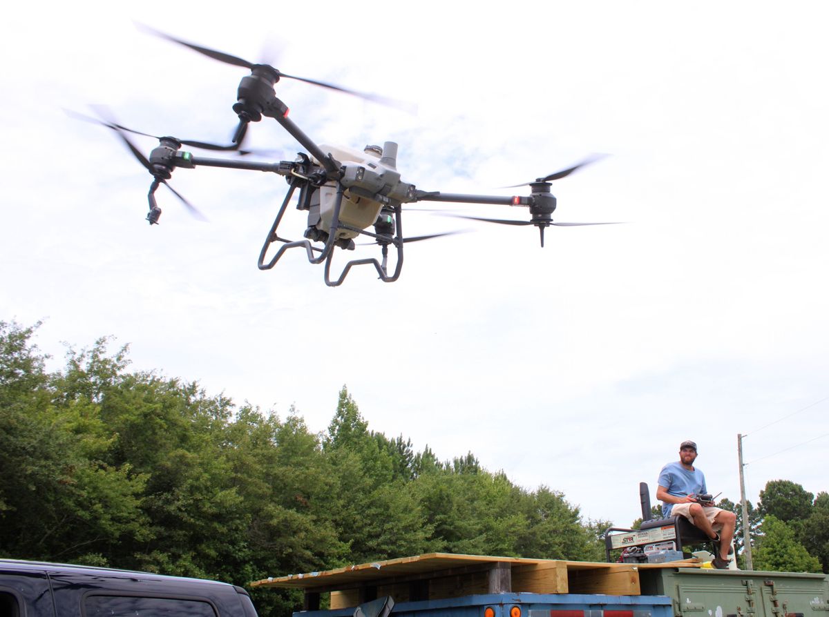 Drone helps farmers work wet fields