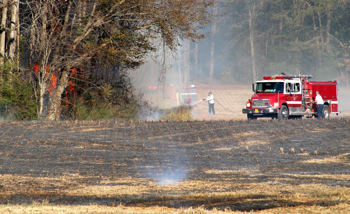 Fire spreads to field
