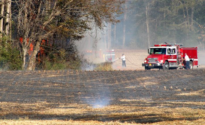 Fire spreads to field