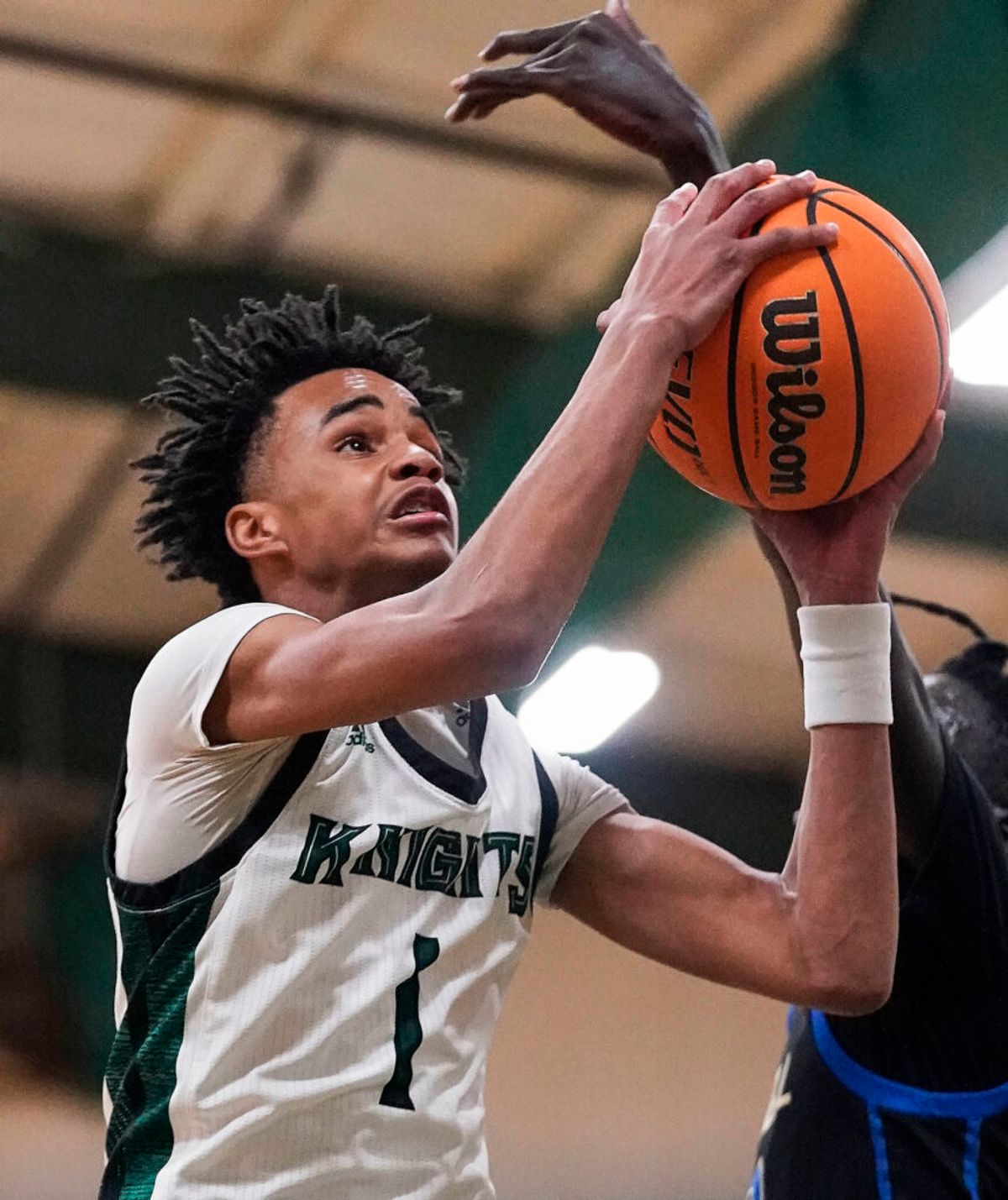 Edwards hits 1K in Knights’ winning debut