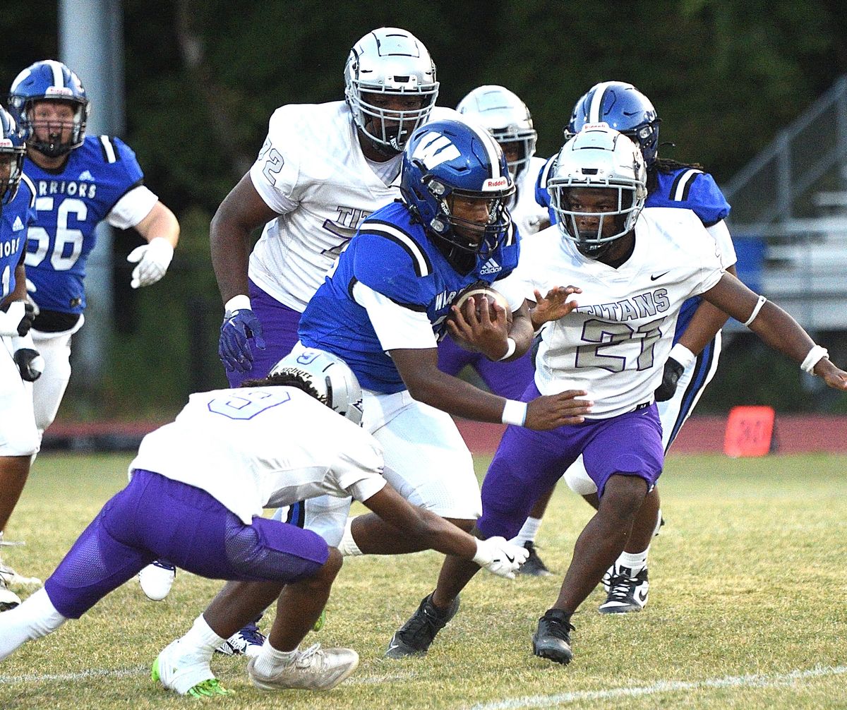 Warriors pull away in 2nd half, blitz Titans 40-22
