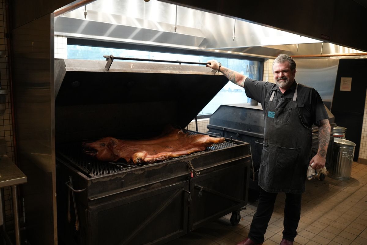 Smoke rises as Rodney Scott's BBQ opens