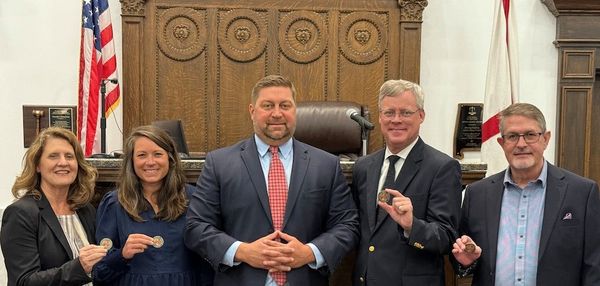 DA Matt Casey recognizes four assistants