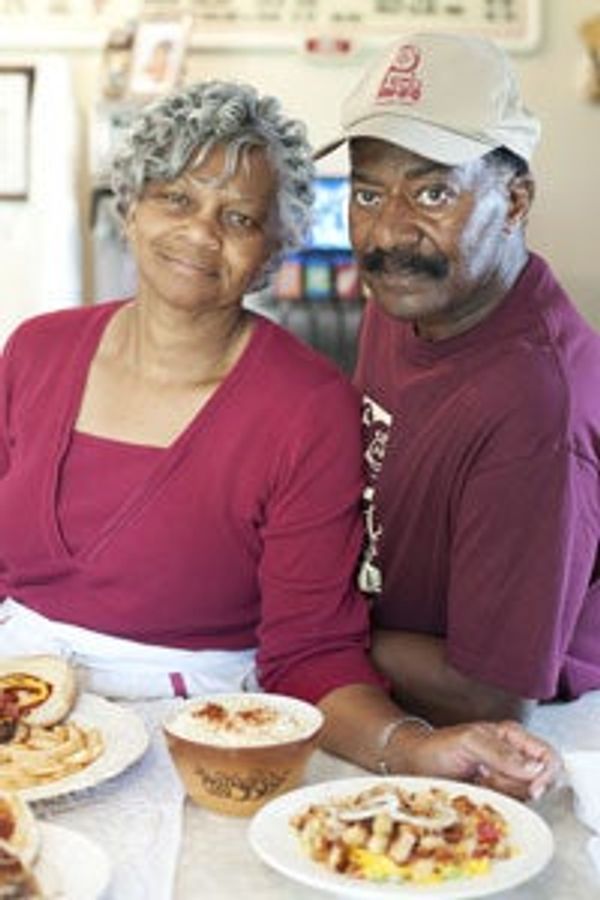 Two men charged after one fires gunshot at the other in PD parking lot