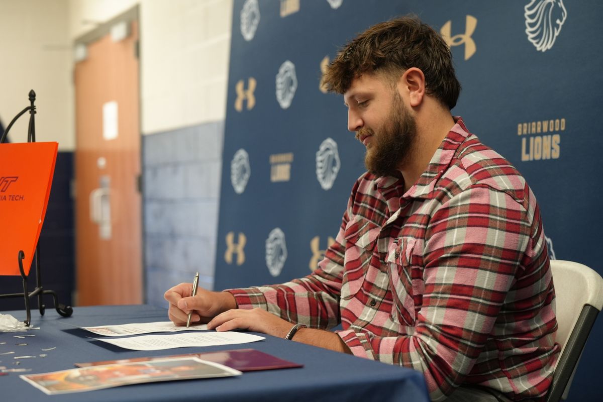 Enter Witherington: Garrett Witherington signs to play football at Vir...