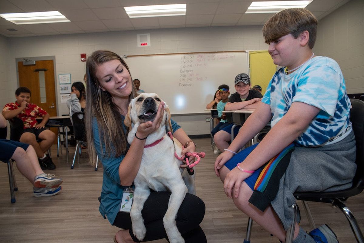 PROFILE: Serving her purpose: Cricket the dog creates special learning...