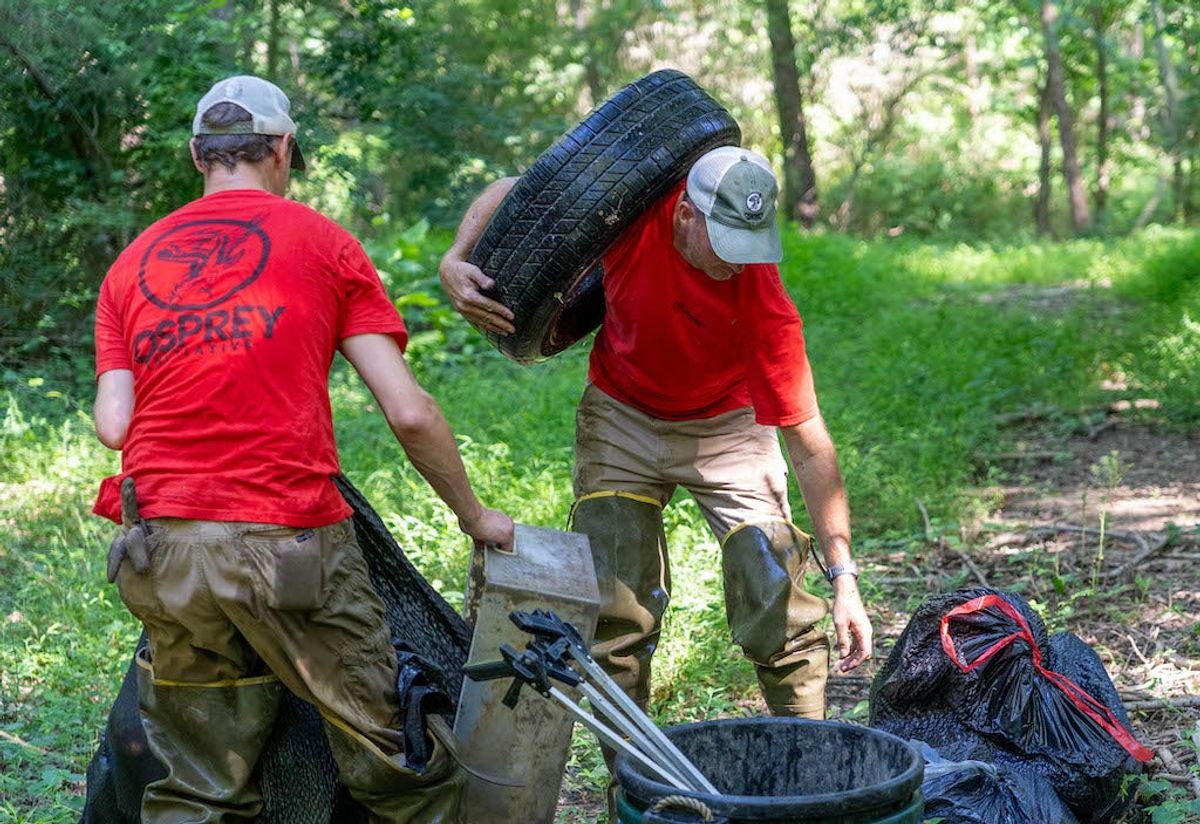 Osprey Initiative workers remove litter from Buck Creek