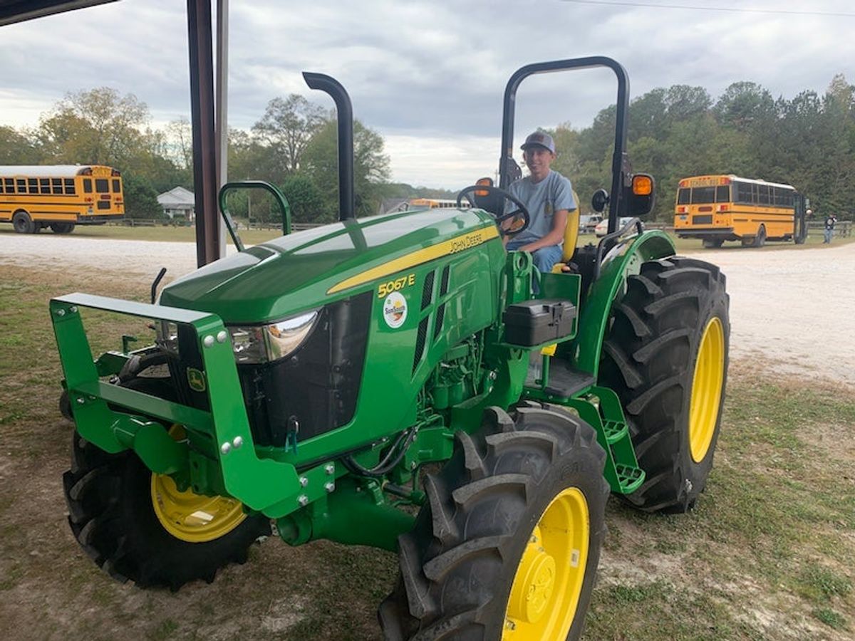 Smith takes 1st place in central district tractor driving competition