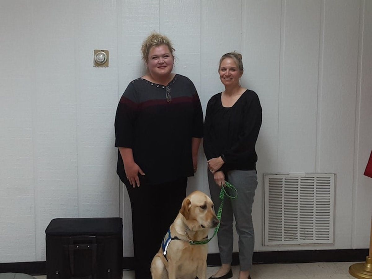 Dogs help victims find courage
