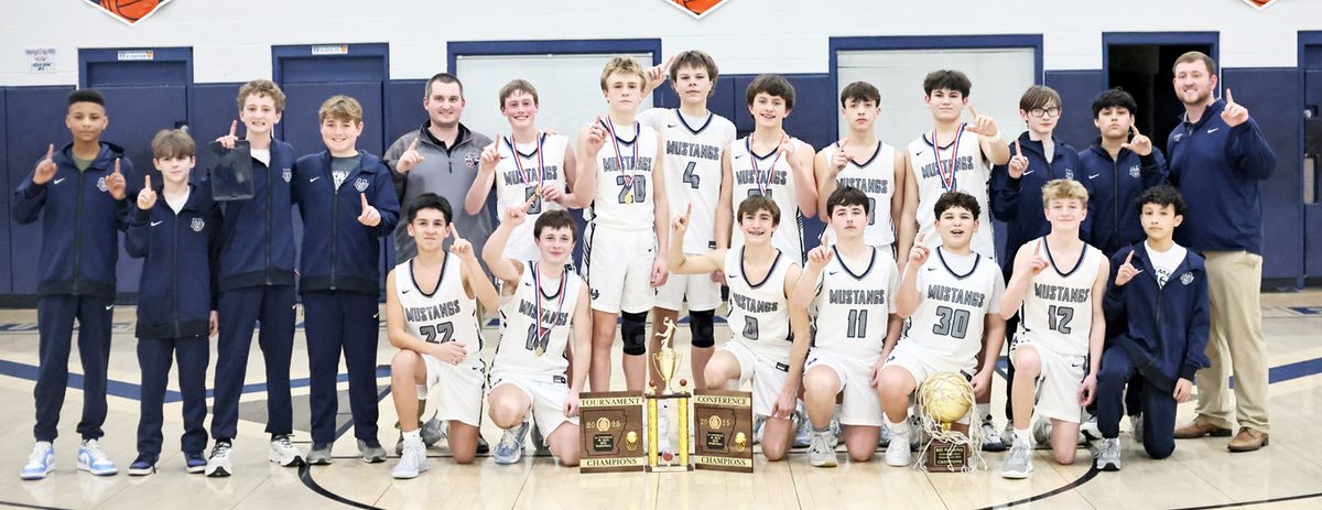 Junior Mustangs win district tournament title