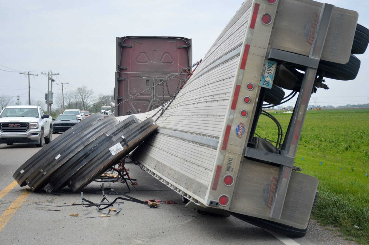 Truck loses load on Highway 198