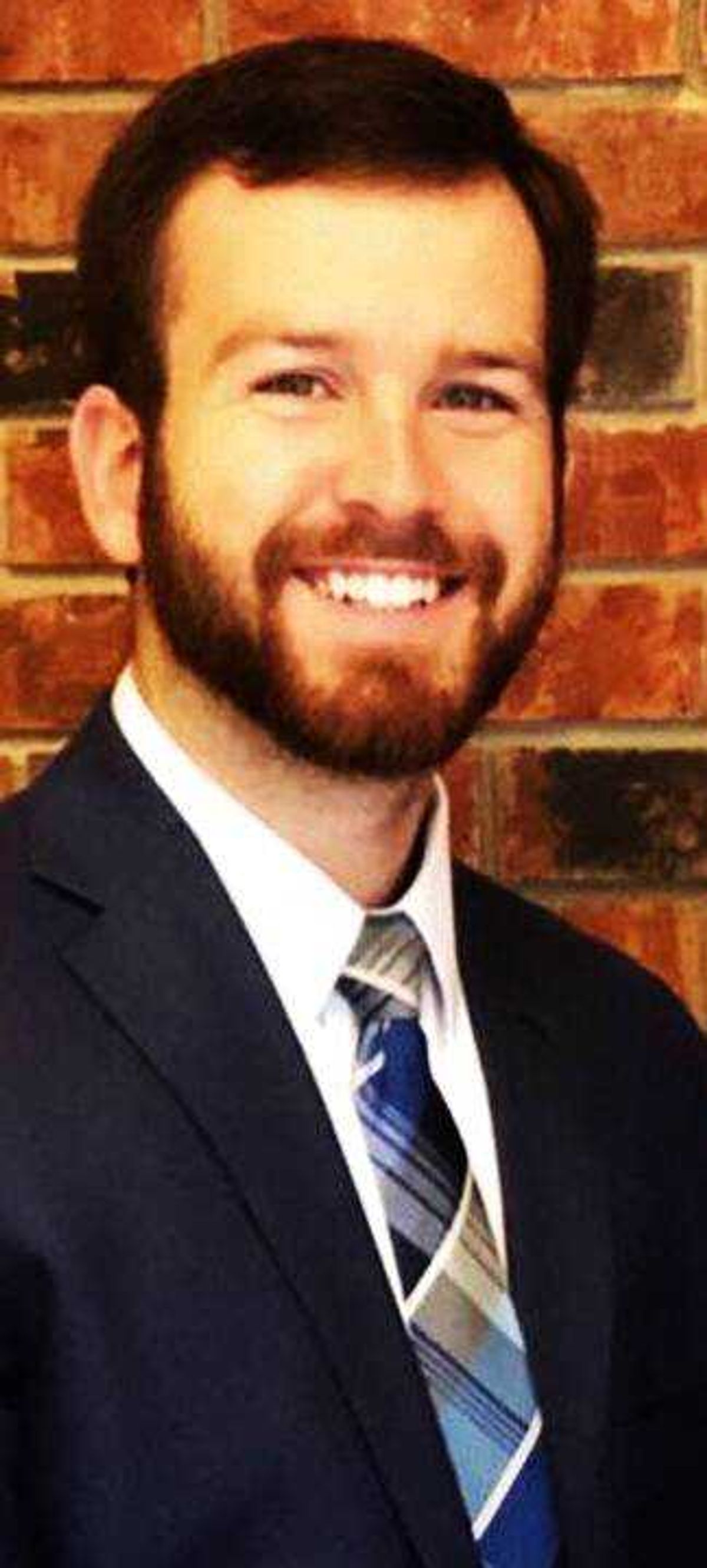 Chris Brown hired as new county attorney
