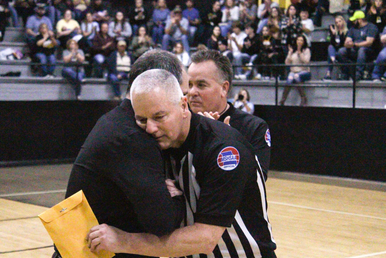 Community comes together for referee