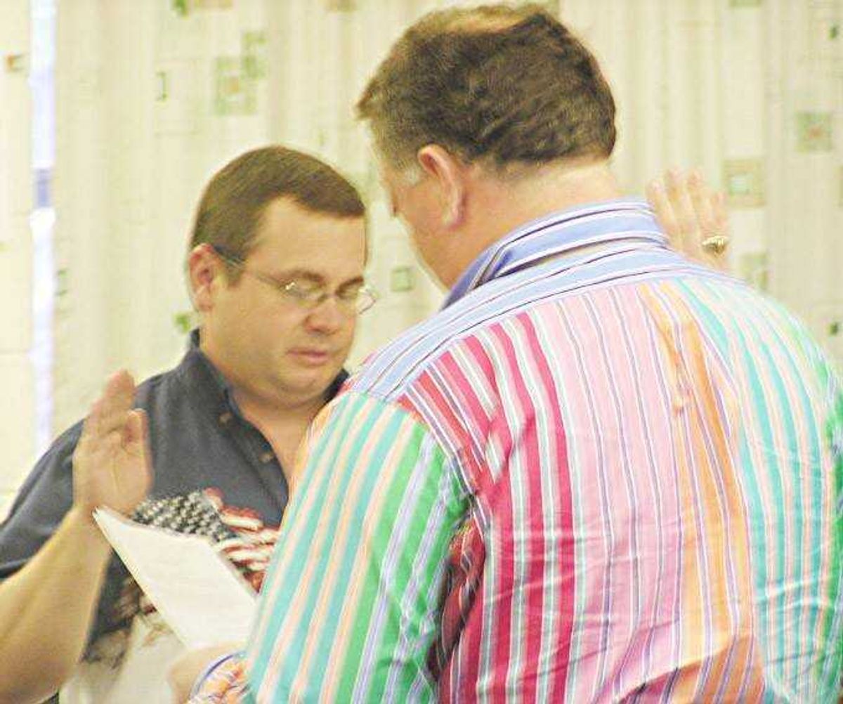 Board reorganized and accepts resignations, including Poorman's