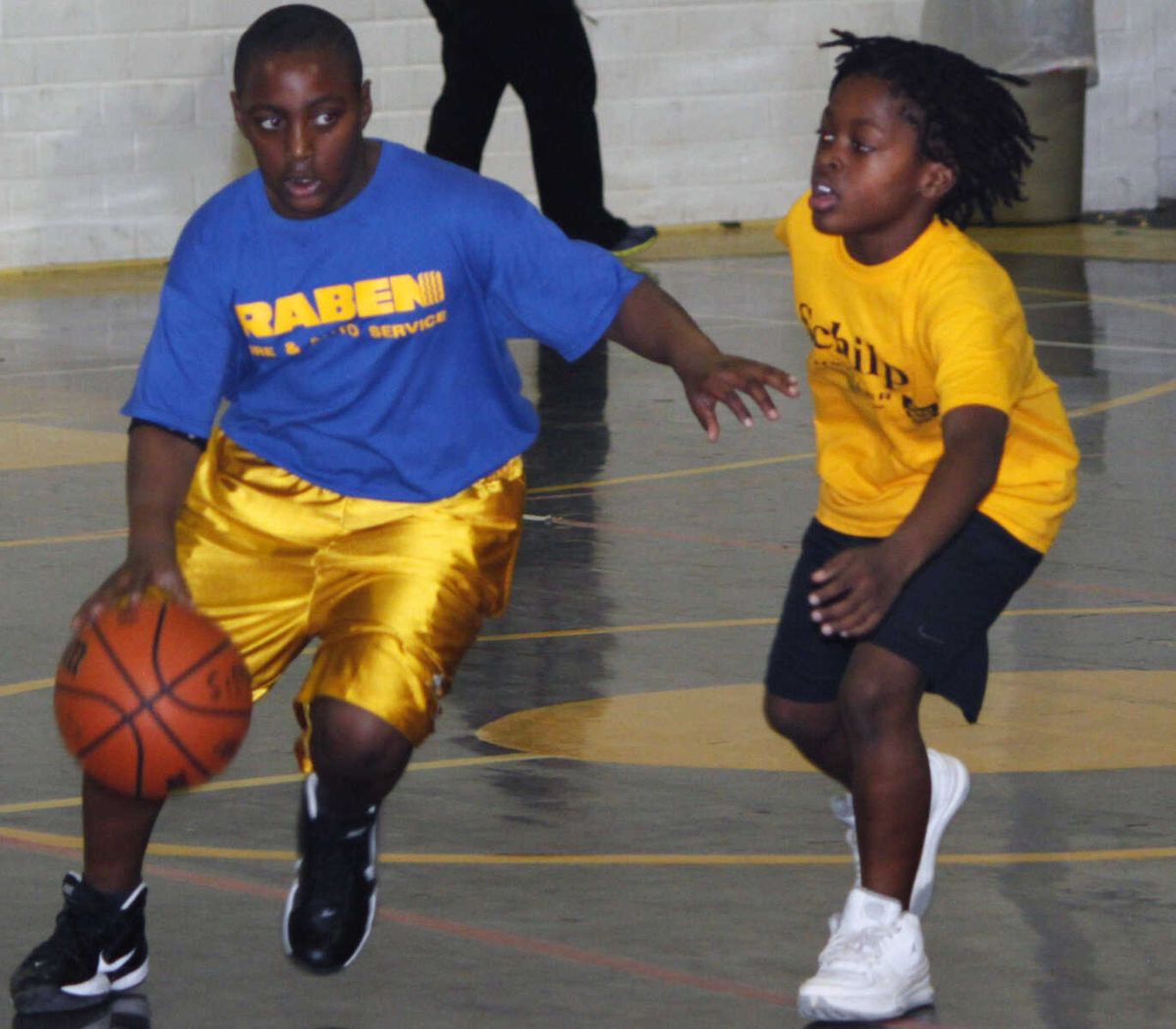 Kennett Kiwanis Little League basketball teams in action