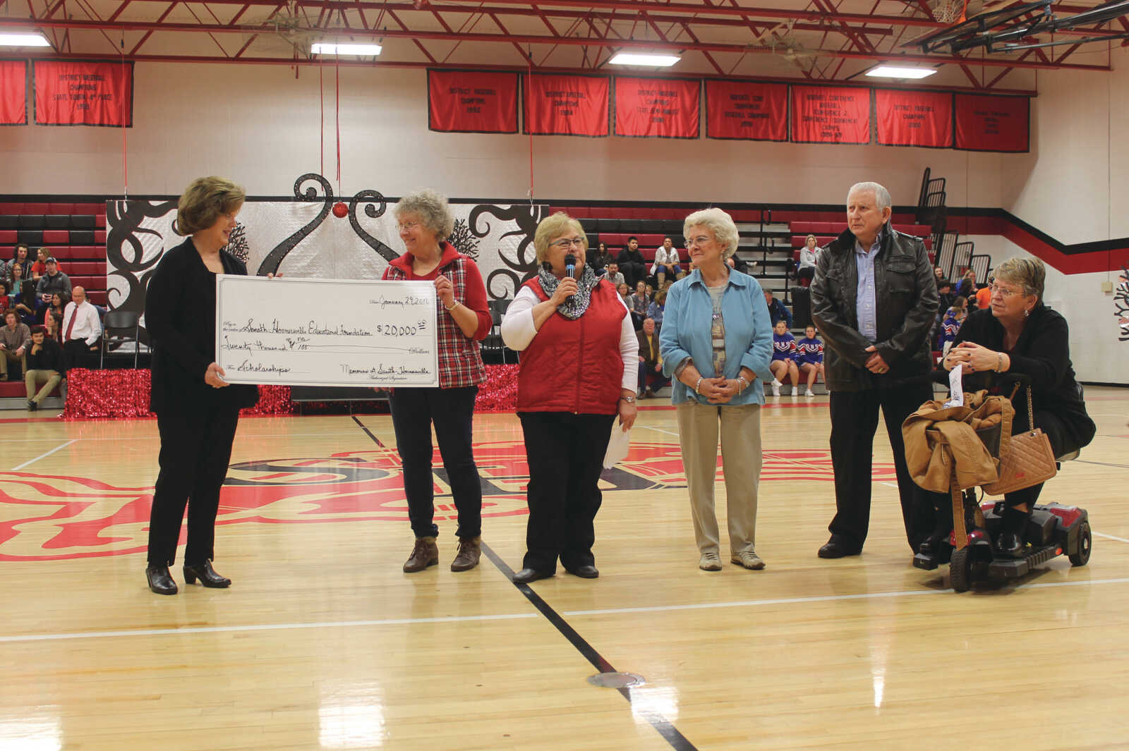 SH Educational Foundation gets check from alumni