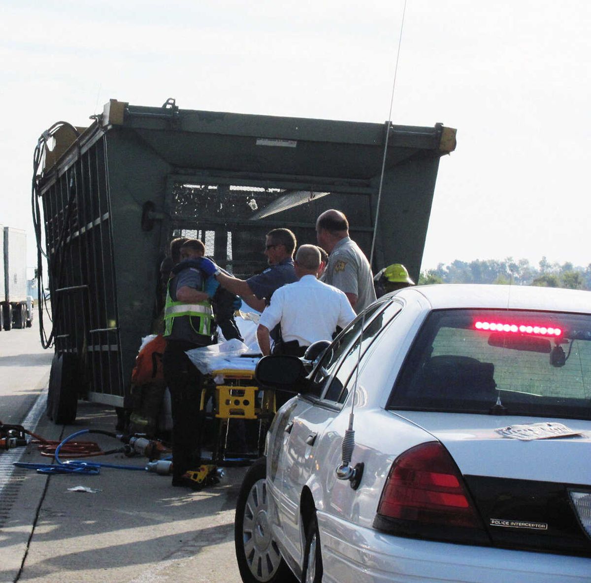 Woman, child trapped under farm trailer in accident