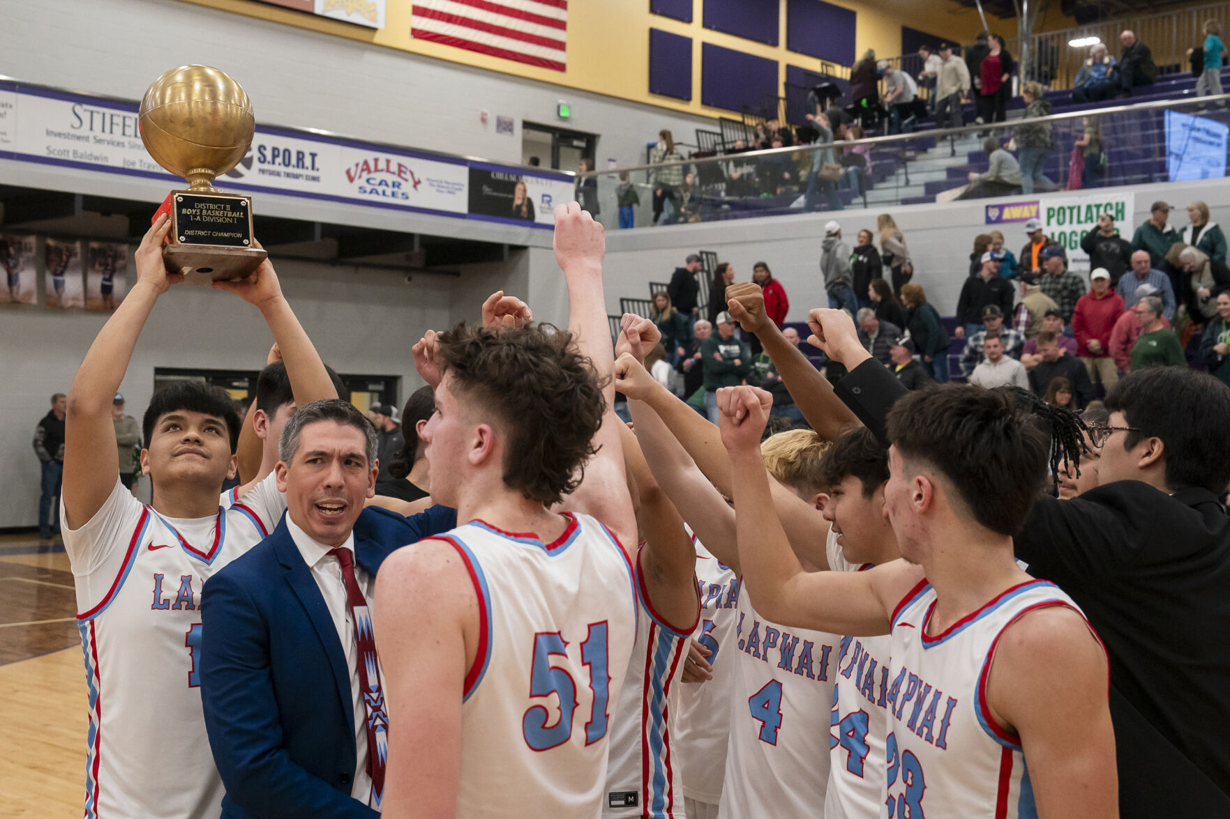 HIGH SCHOOL BASKETBALL: Lapwai Wildcats lift district trophy after def...