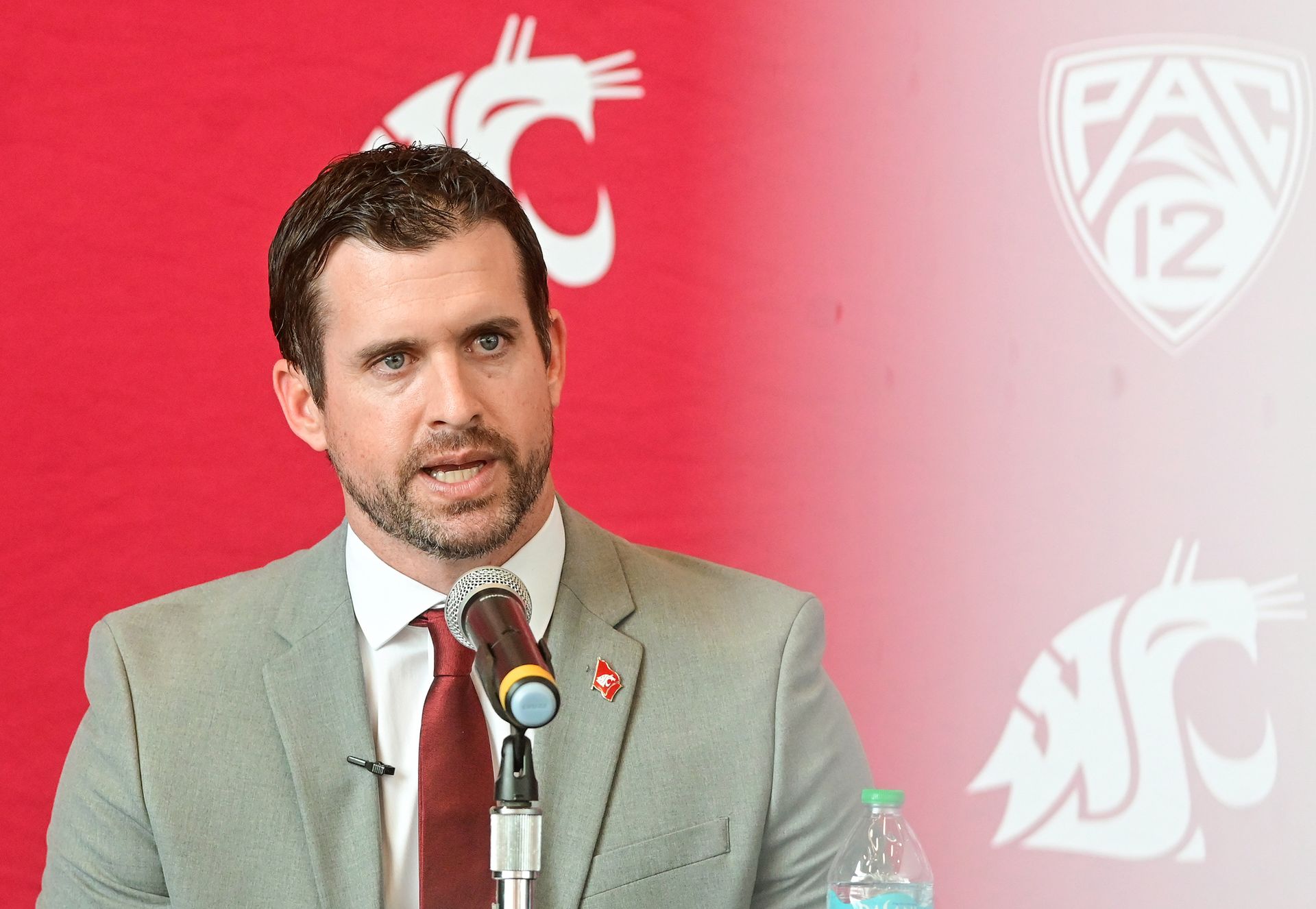 COUGAR NOTES: Rogers, Washington State football building staff, roster