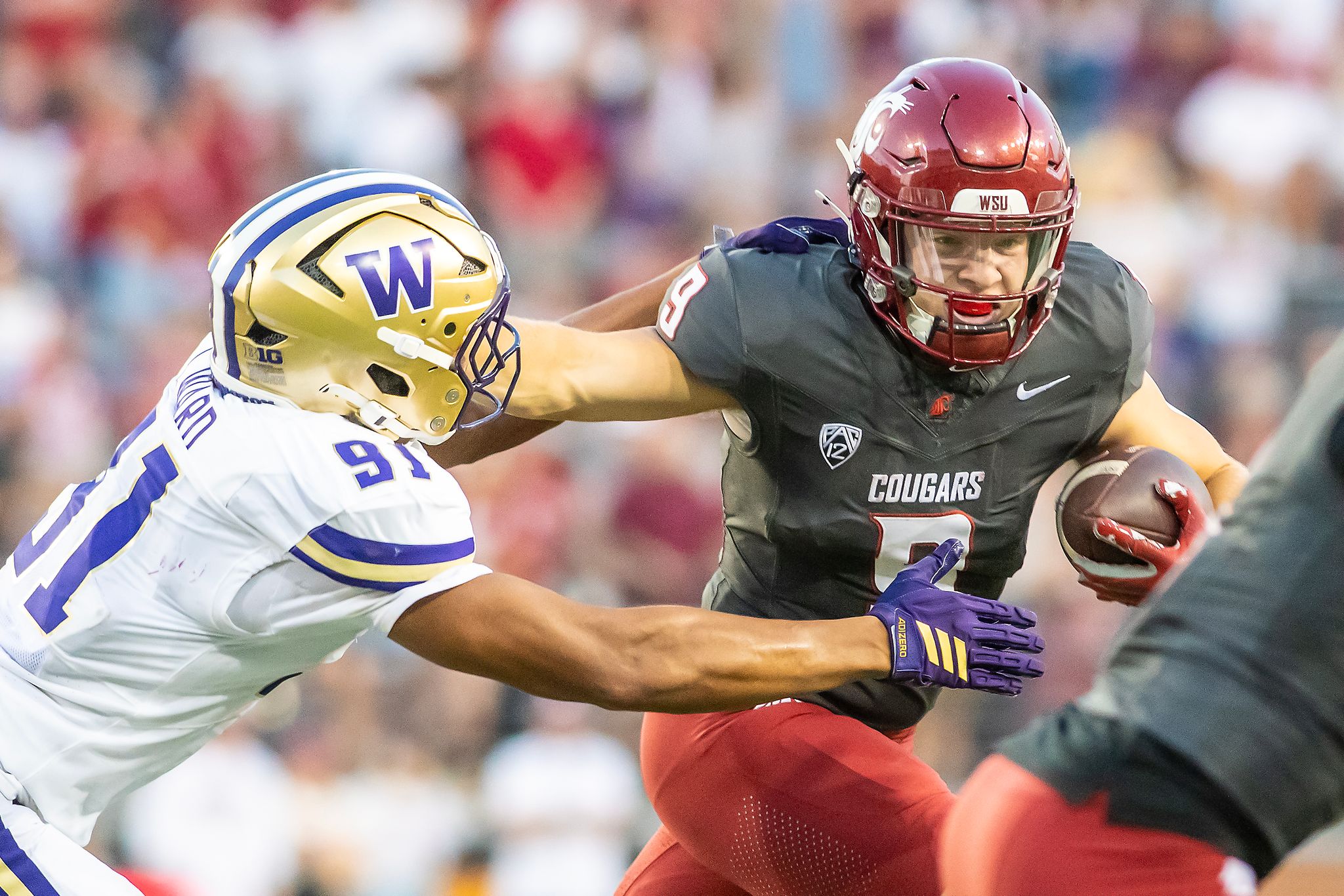 Cougars can’t keep up with Huskies’ historic offensive output in blowo...