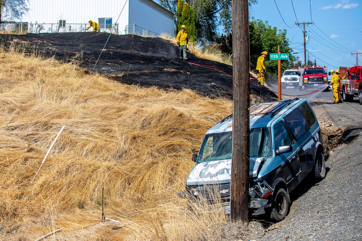 Car accident causes small grass fire