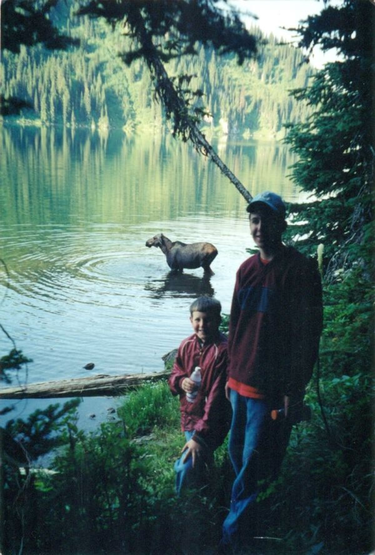 Brag Board: brothers pose with bathing moose