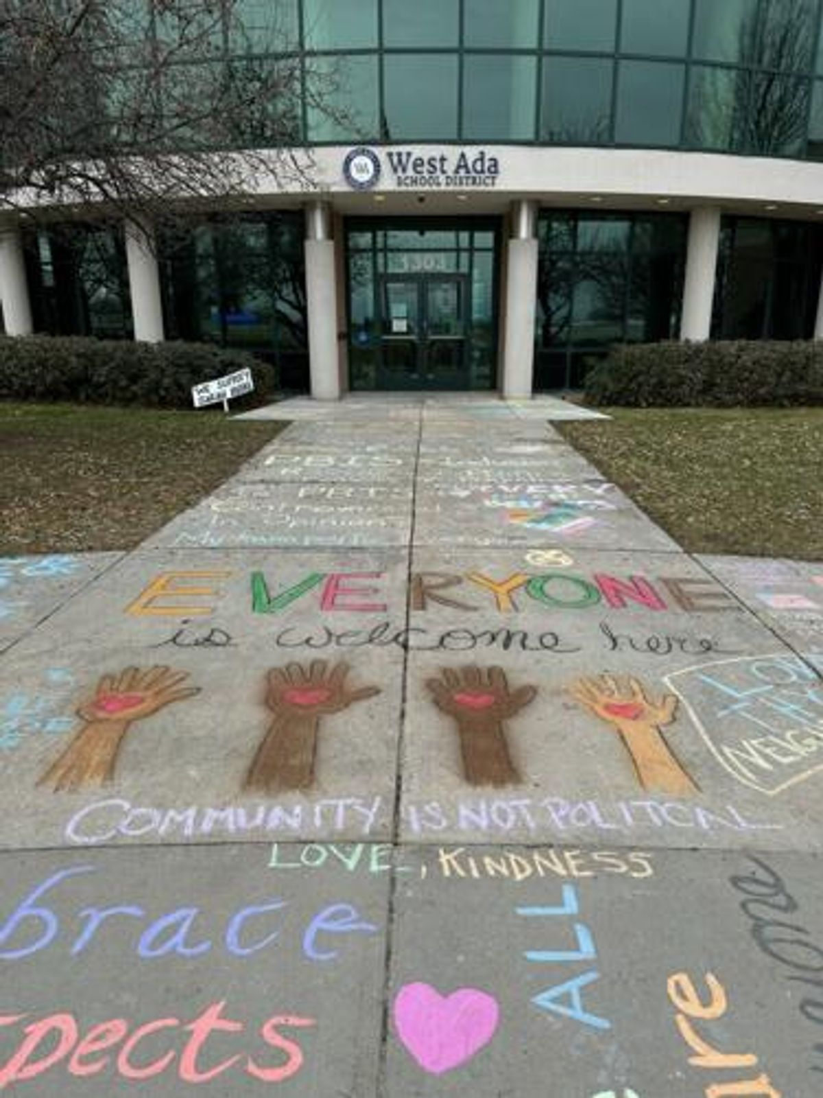 West Ada washes off chalk art amid inclusive poster controversy