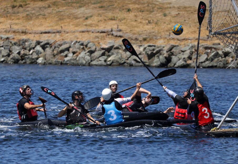 Water sports enthusiasts hooked on kayak polo