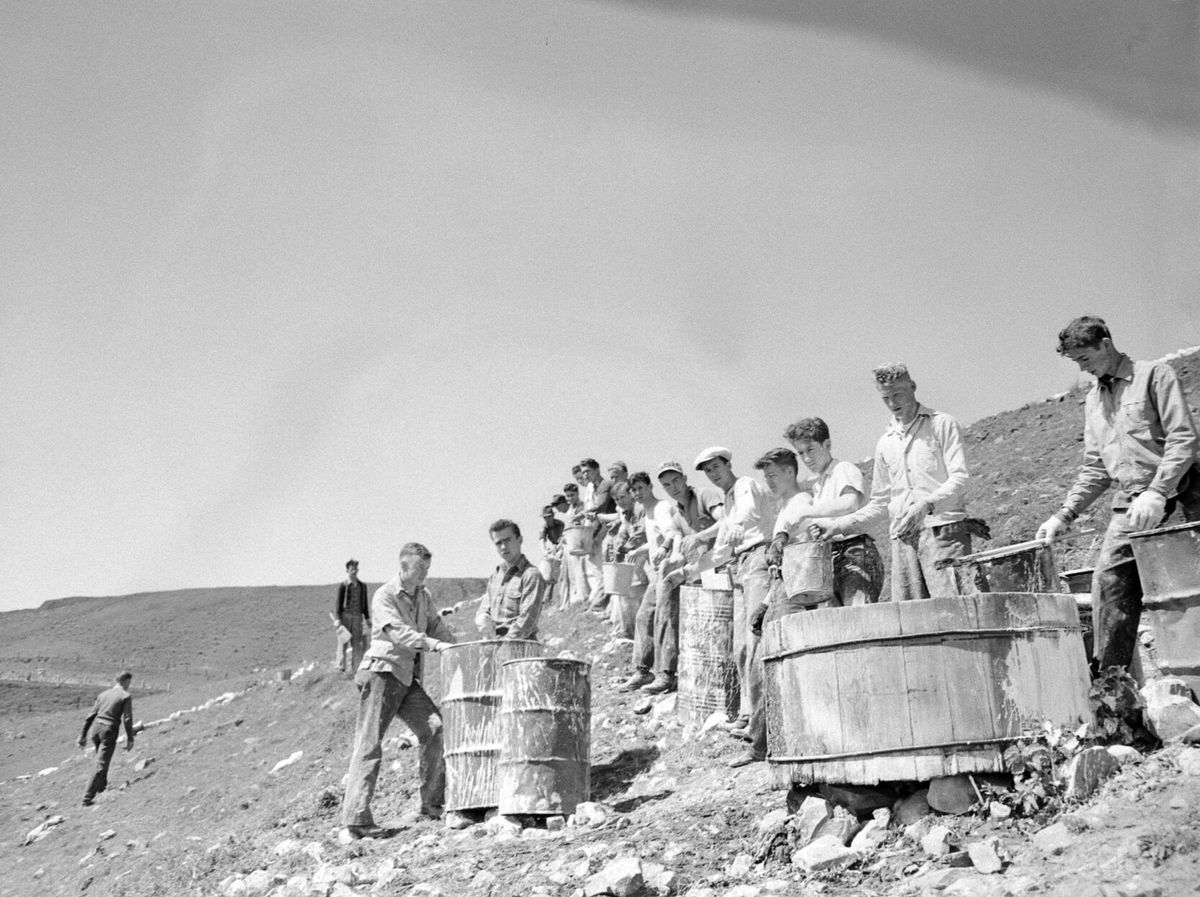 Blast from the Past / 1941: Working together to whitewash rocks