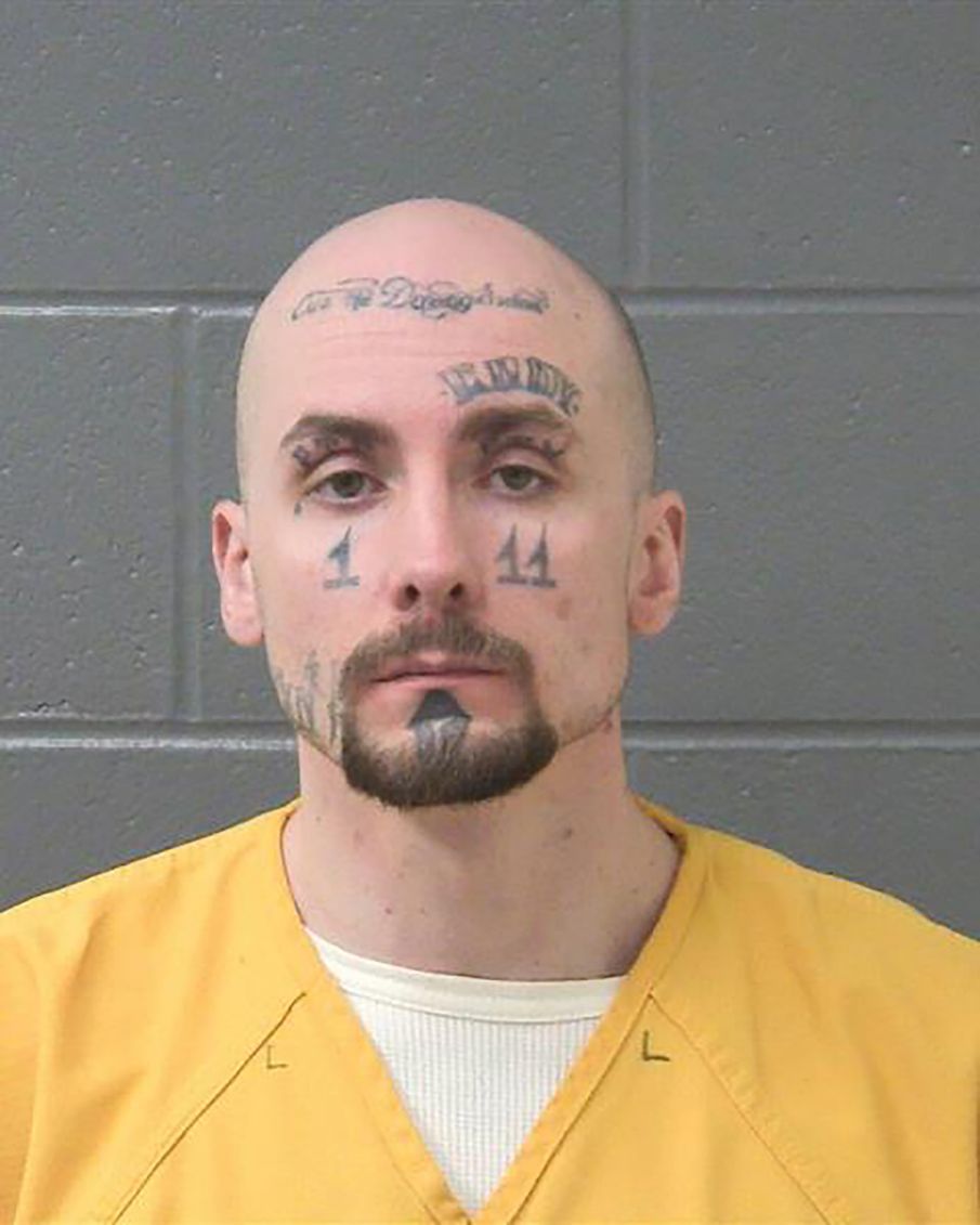 Prison-escapee gets two life sentences for murder charges