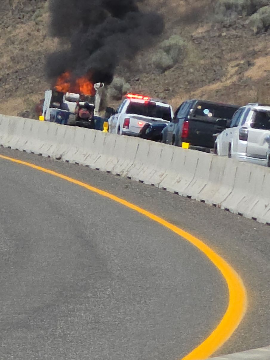 UPDATE AT 4:57 P.M.: Truck fire that led to brush blaze snuf...