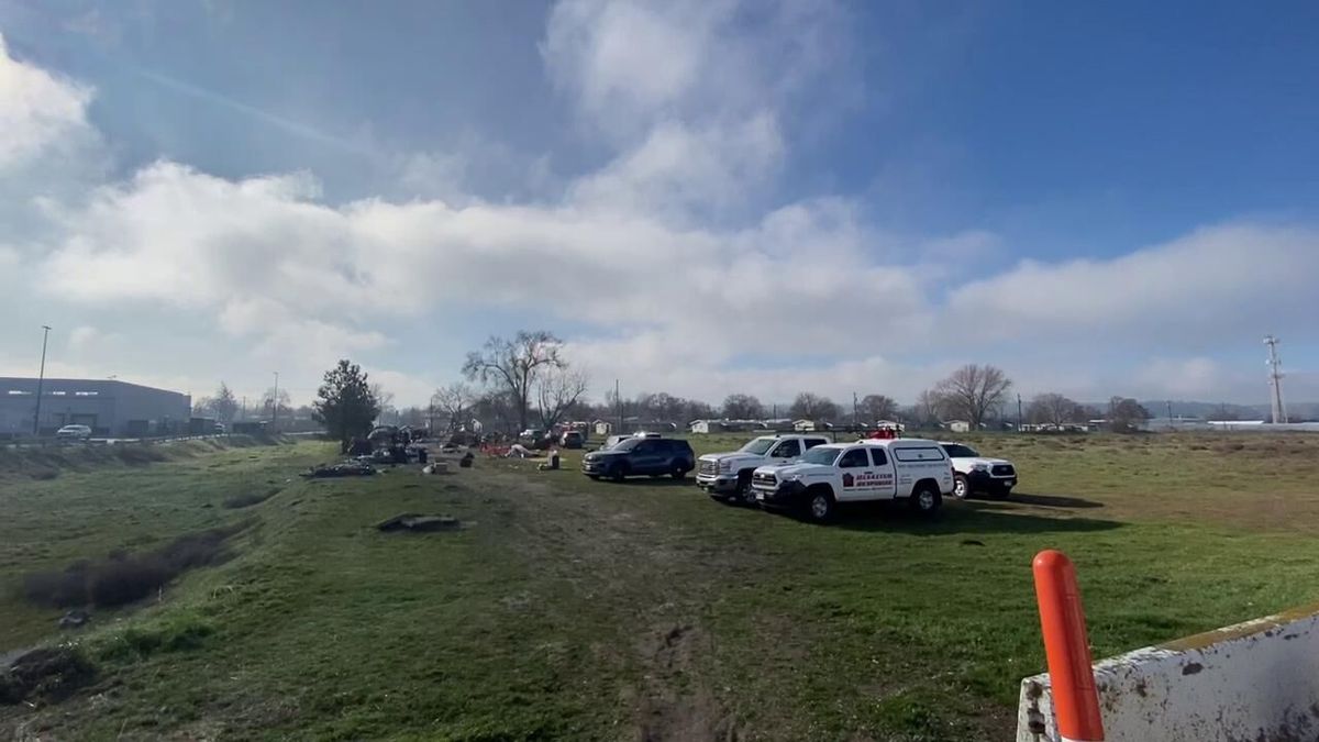 City efforts to clean up homeless camp underway this morning (WITH VID...