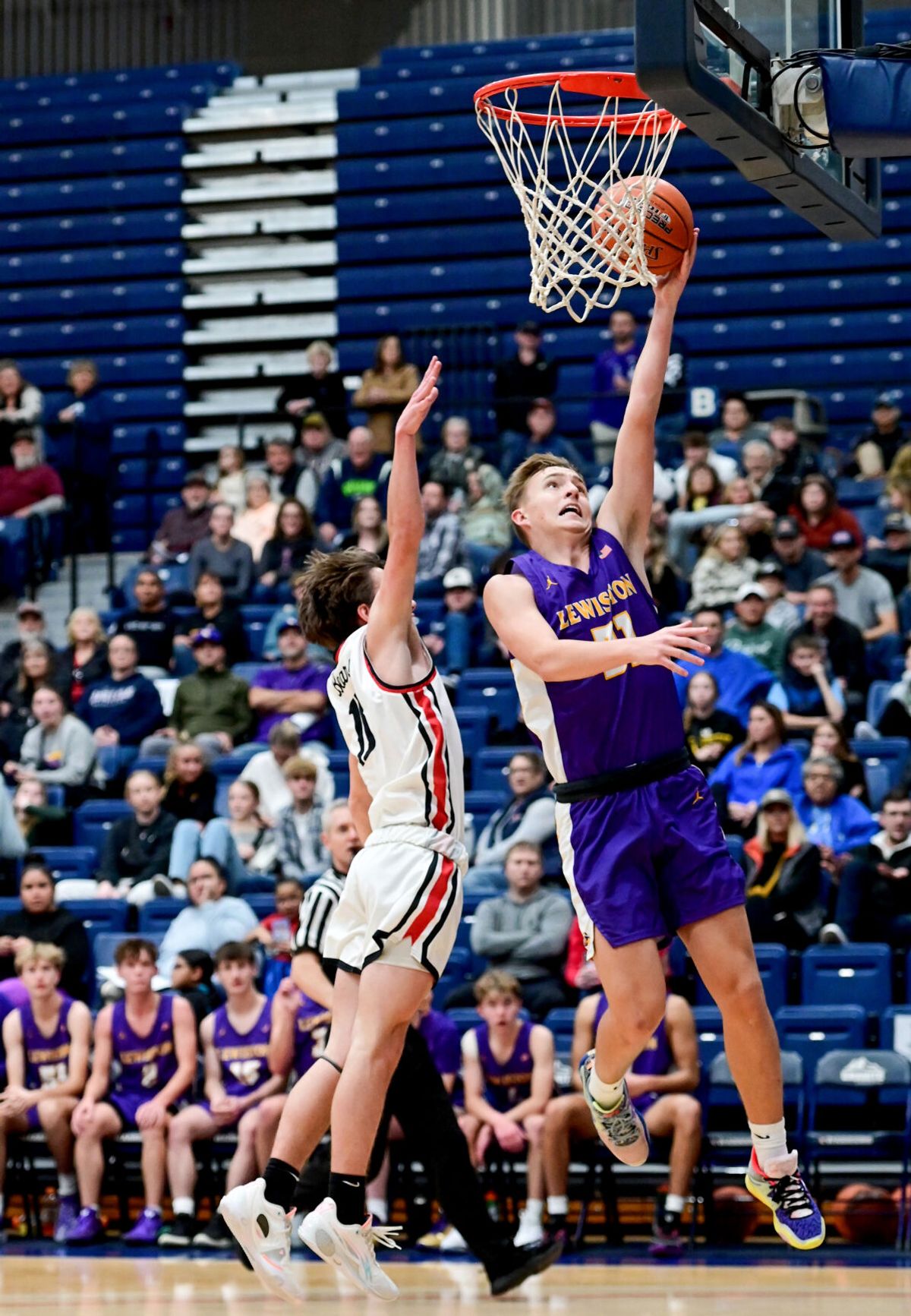 Lewiston boys advance to Avista Holiday Tournament champions...