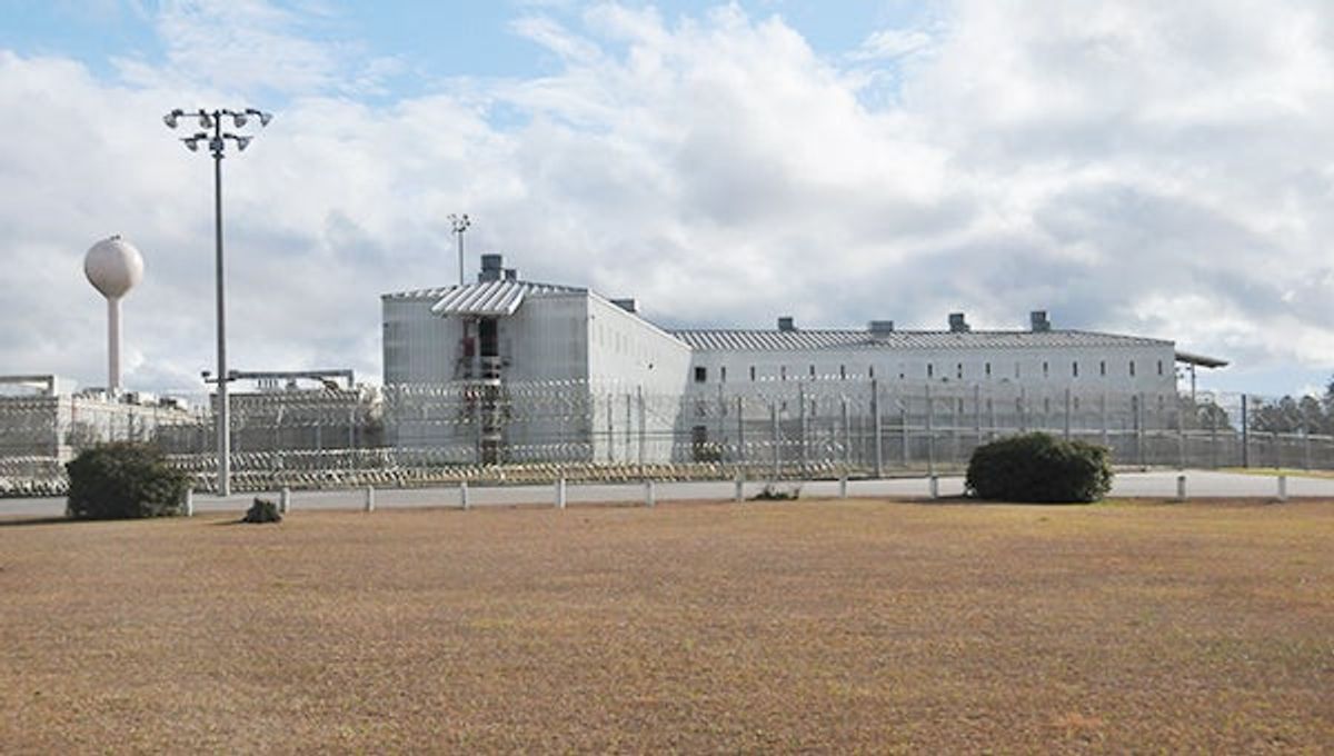 House OKs plan to close 14 prisons, build 4 new