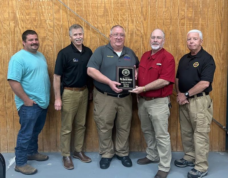 Adams honored as he enters retirement