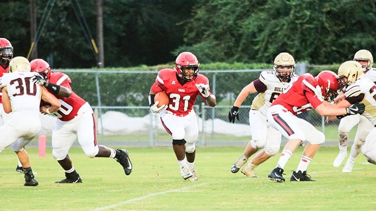 Tigers rush past Washington County, 41-0