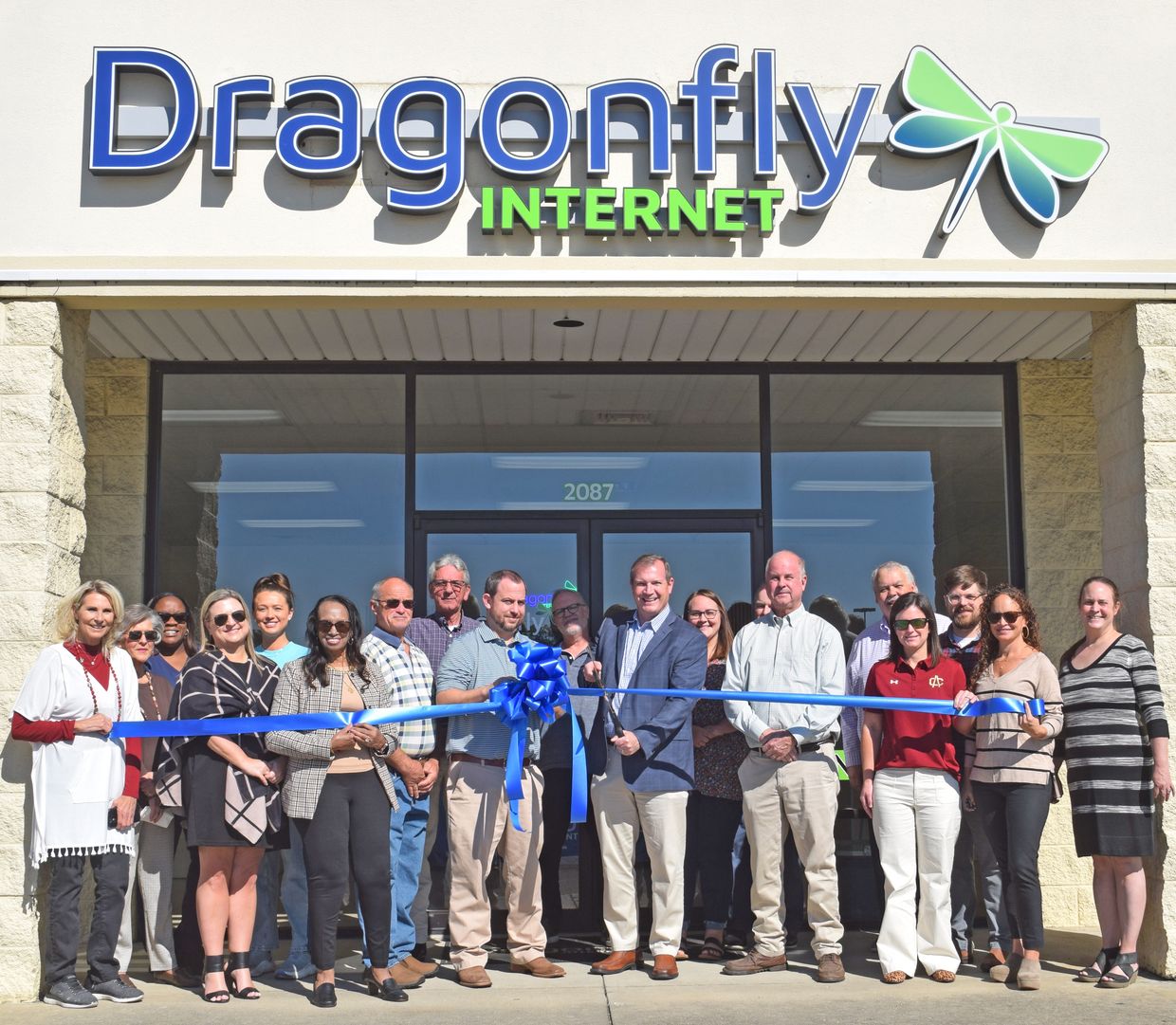 Dragonfly surfs in for ribbon cutting
