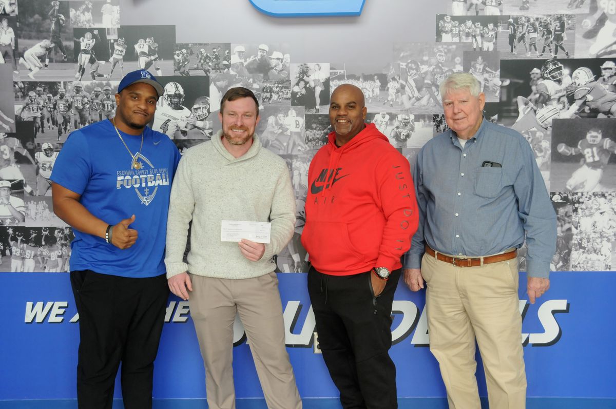 Jason Pilger Chevrolet donates to Escambia County football p...