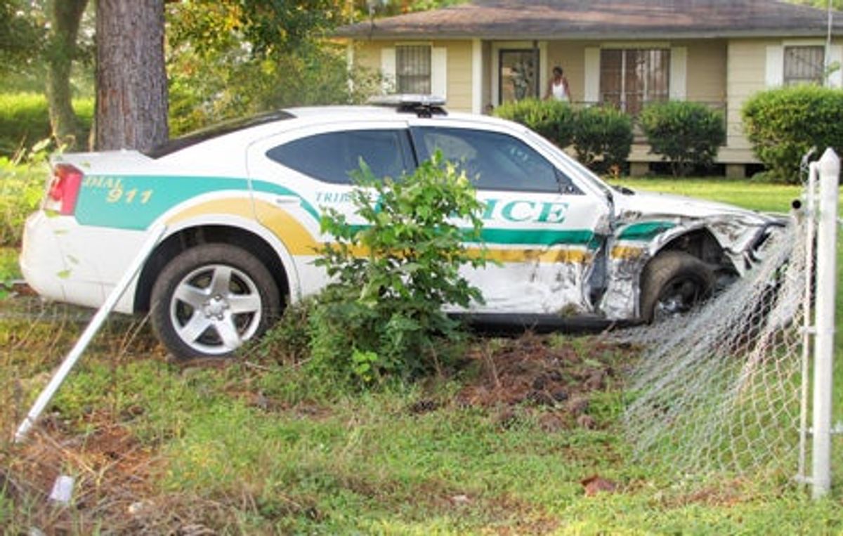 Police car, school bus collide