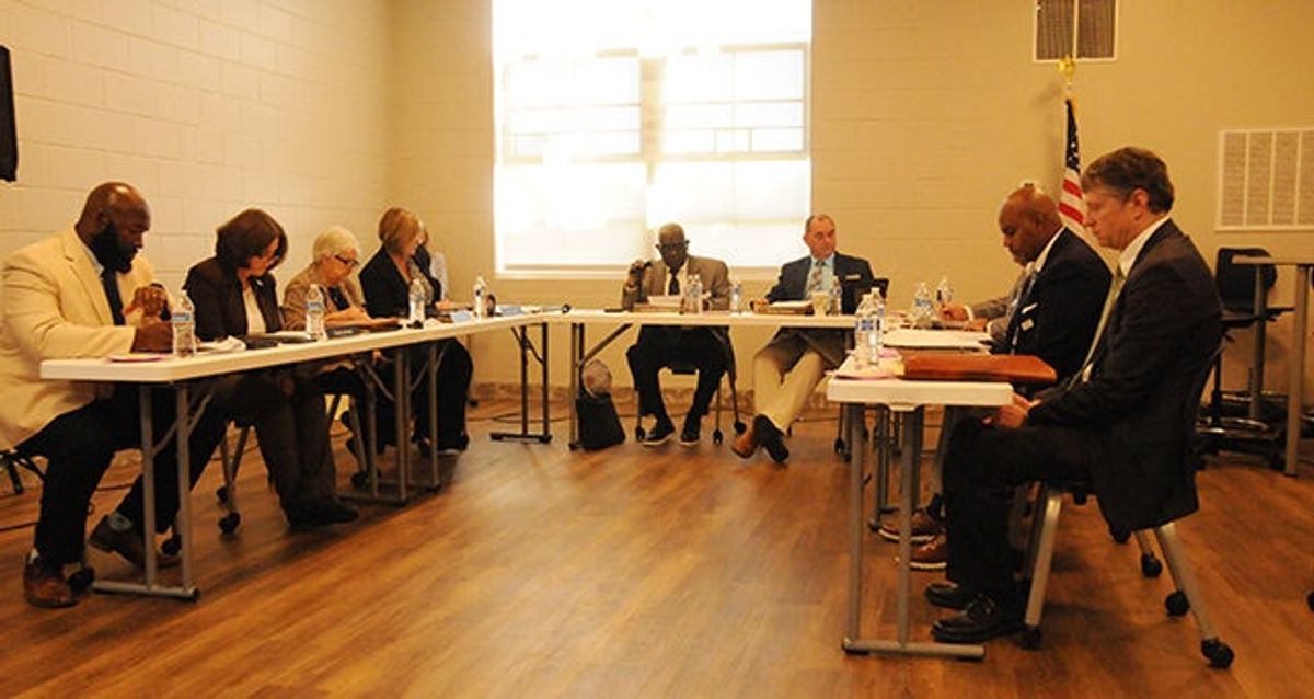 BOE approves flooring contract for A.C. Moore Primary, science textboo...